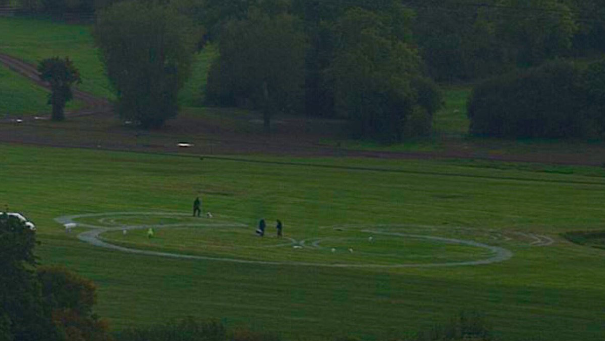 Radiohead's 'modified bear' logo appears in Glastonbury field