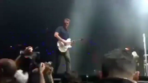 Video footage has emerged of Josh Homme kicking a photographer in the face